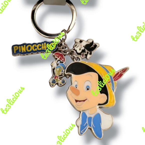 Disney | Accessories | Disney Parks Pinocchio Key Charms | Poshmark